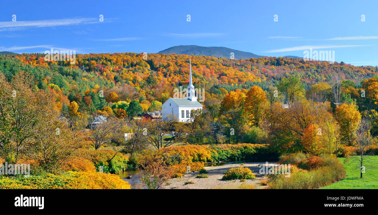 Stowe panorama in Autumn with colorful foliage and community church in ...