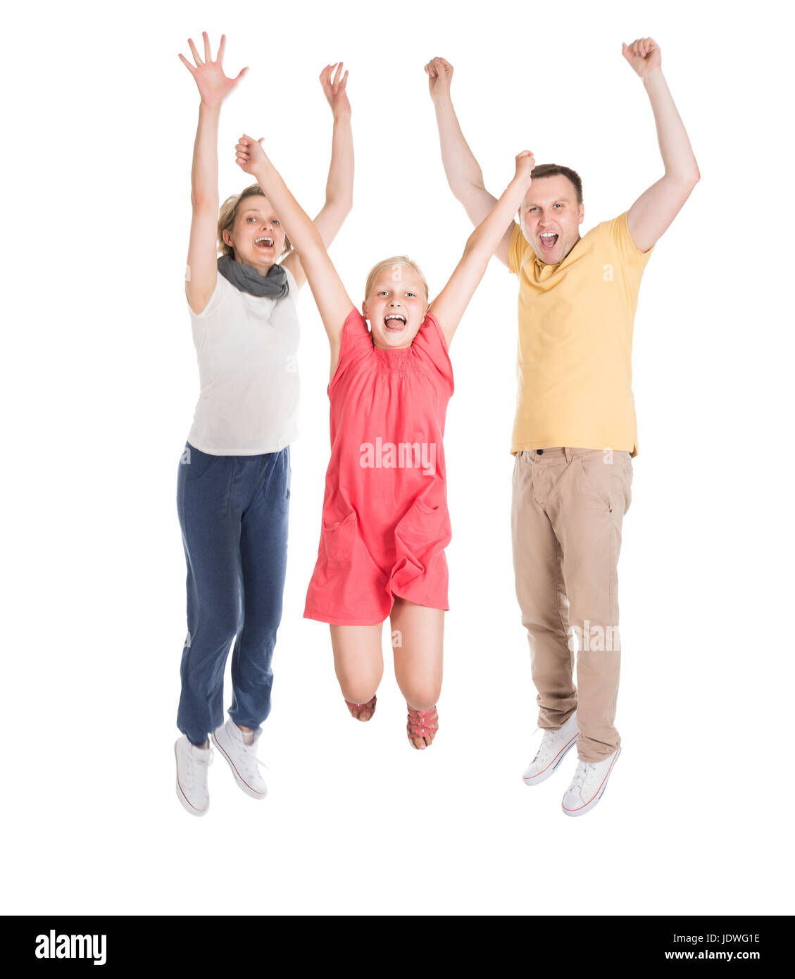 Excited Young Happy Family Jumping. Isolated On White Stock Photo - Alamy