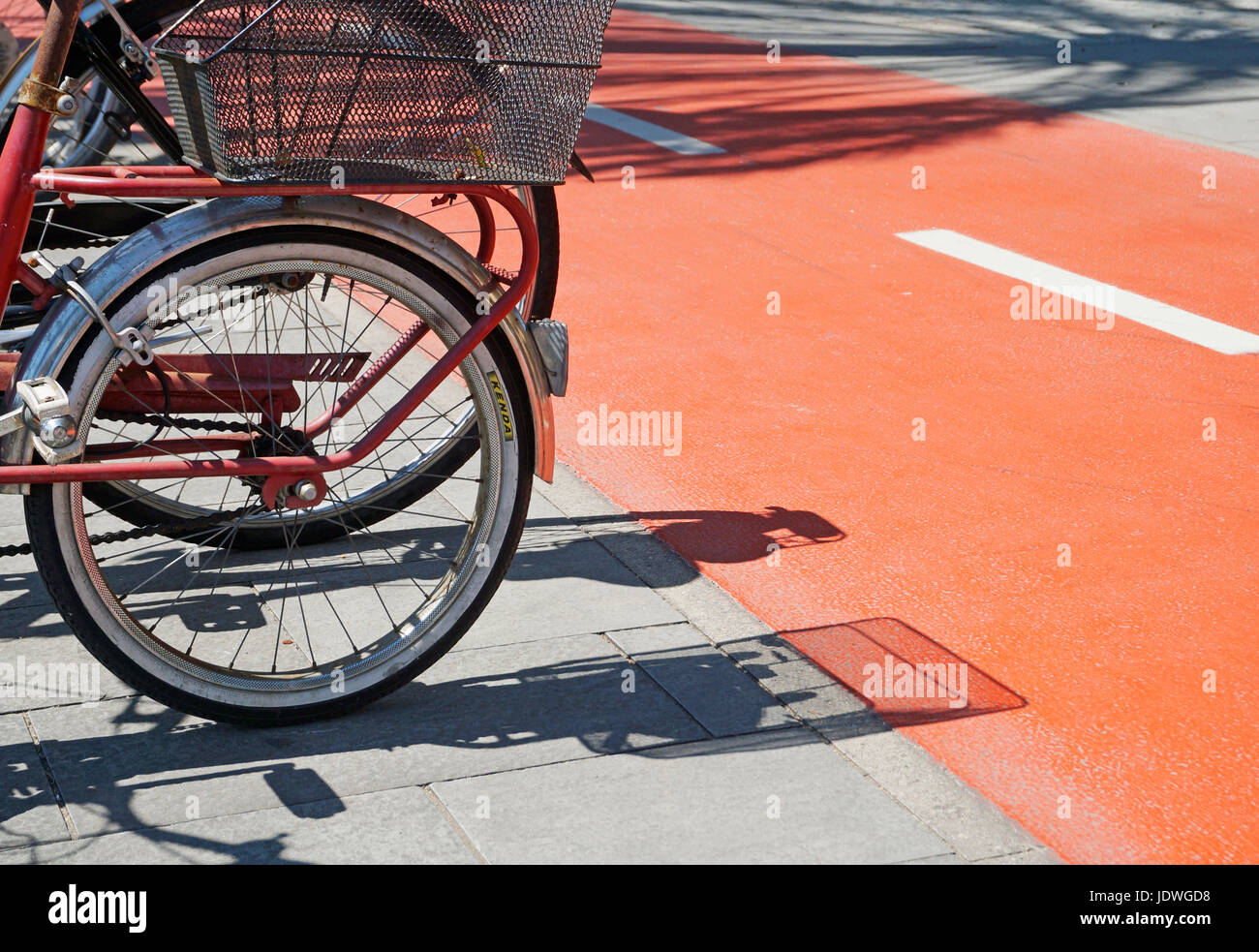 Cycles parked at the side of a cycle lane Stock Photo - Alamy