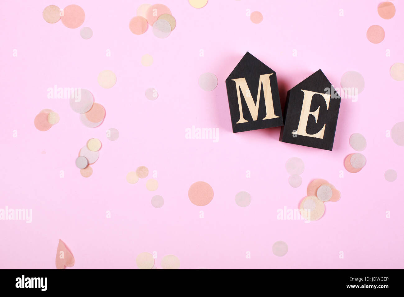 Word ME on wooden cubes on pink background Stock Photo - Alamy