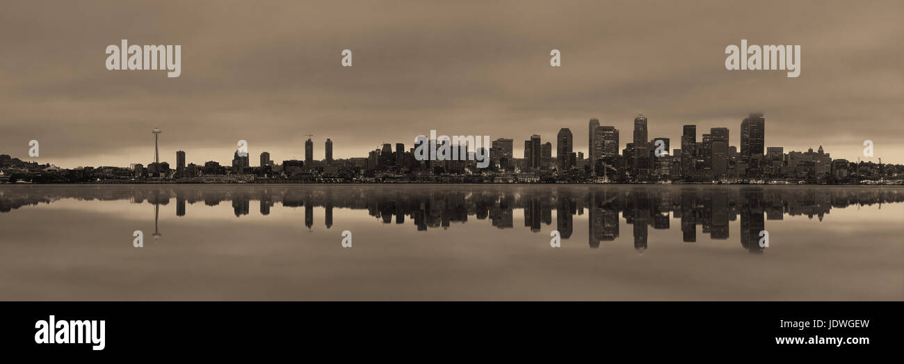 Seattle city skyline view over sea at sunrise with urban architecture ...