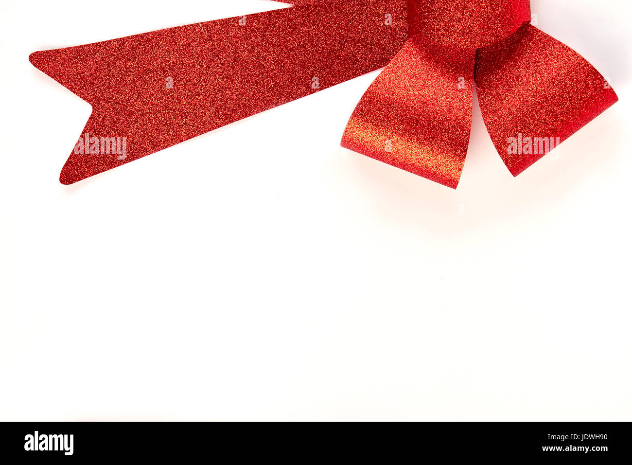 Cropped image of red bow Stock Photo - Alamy
