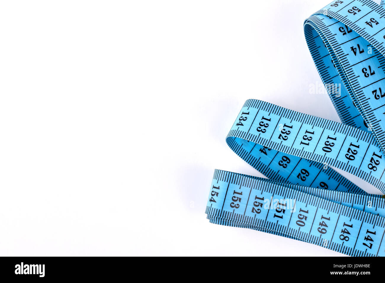 Cropped image of measuring tape Stock Photo - Alamy