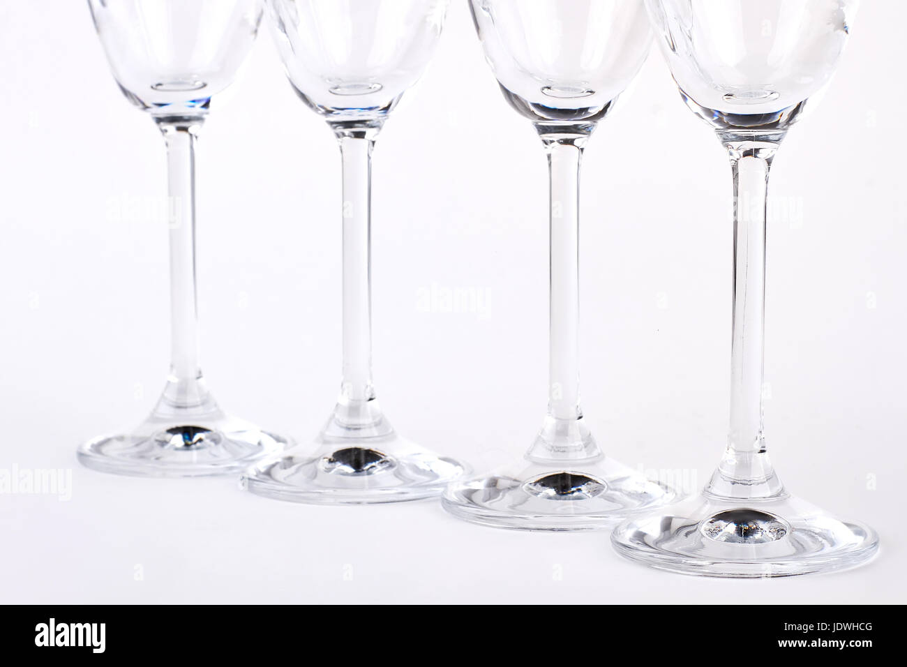 Row of clear empty glasses Stock Photo - Alamy