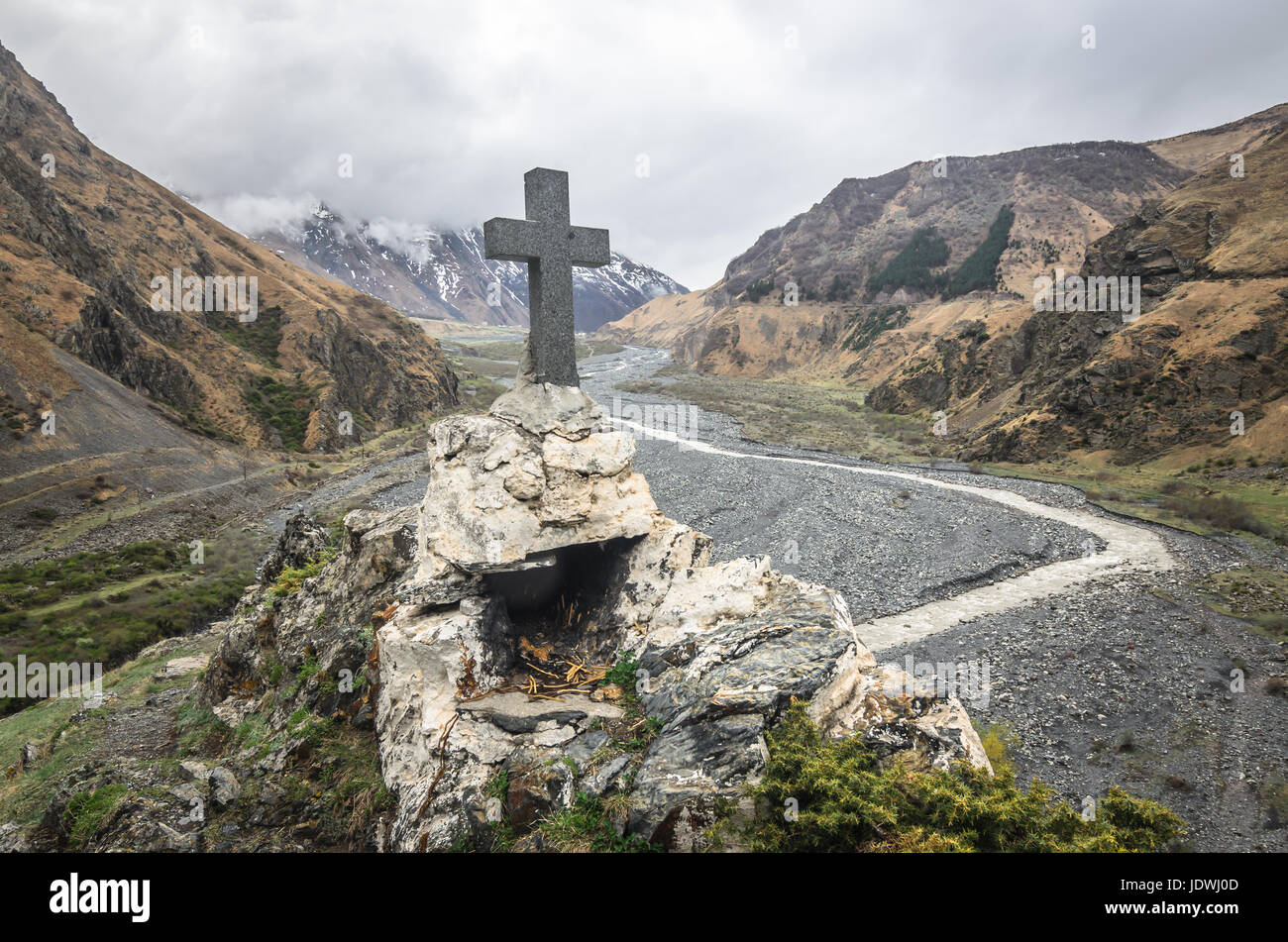 Path to ancient medieval monument in mountains of Caucasus. Christian ...