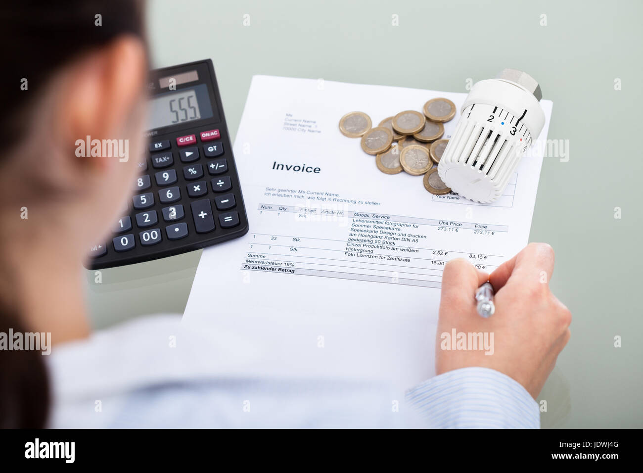 Close-up Photo Of Business Person Analyzing Invoice Stock Photo - Alamy