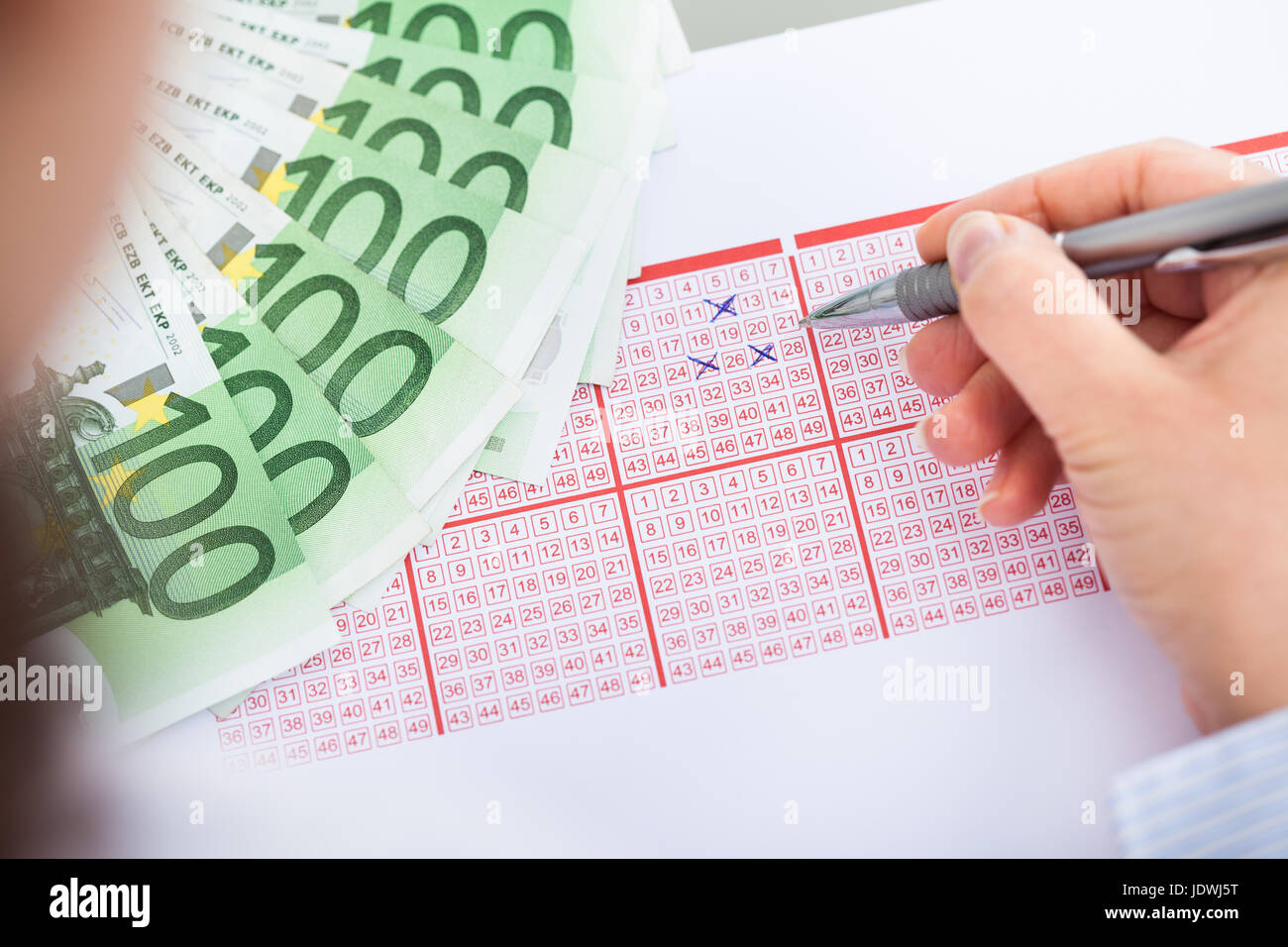 Person holding lottery ticket hi-res stock photography and images - Alamy