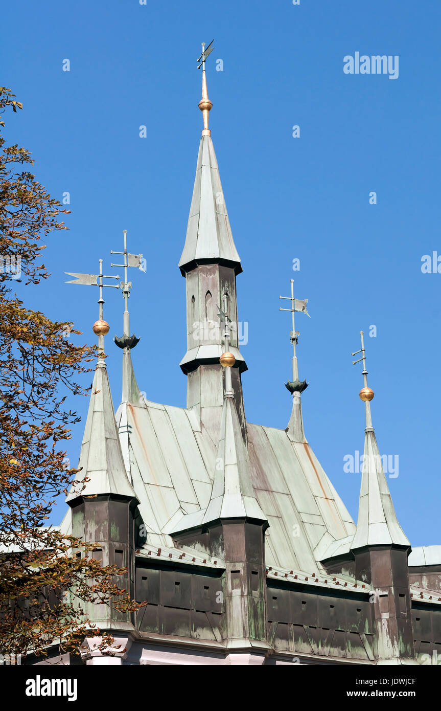 Detail of medieval castle tower and spires Stock Photo - Alamy
