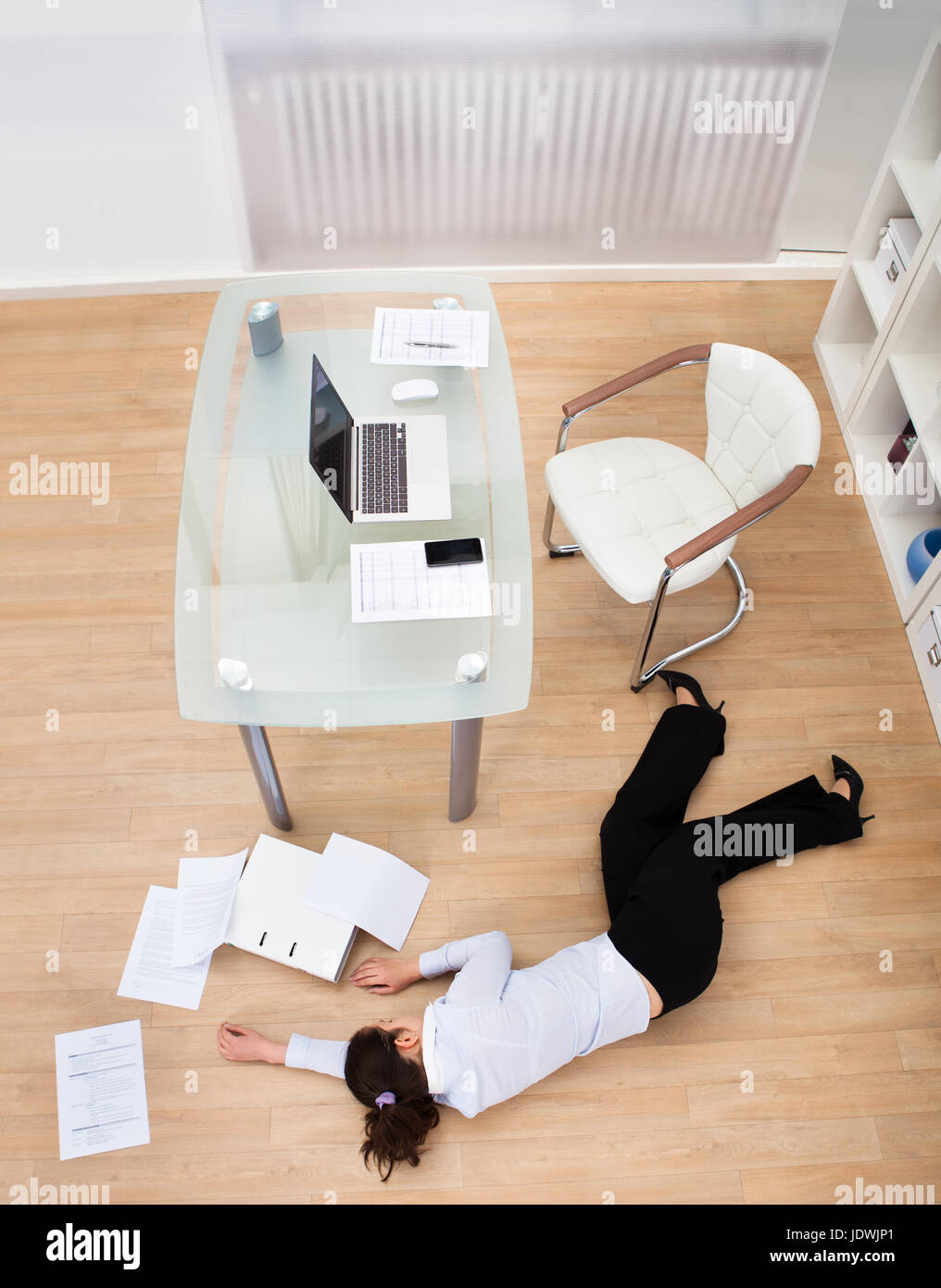 Exhausted Businesswoman Fainted On Floor At Workplace Stock Photo - Alamy