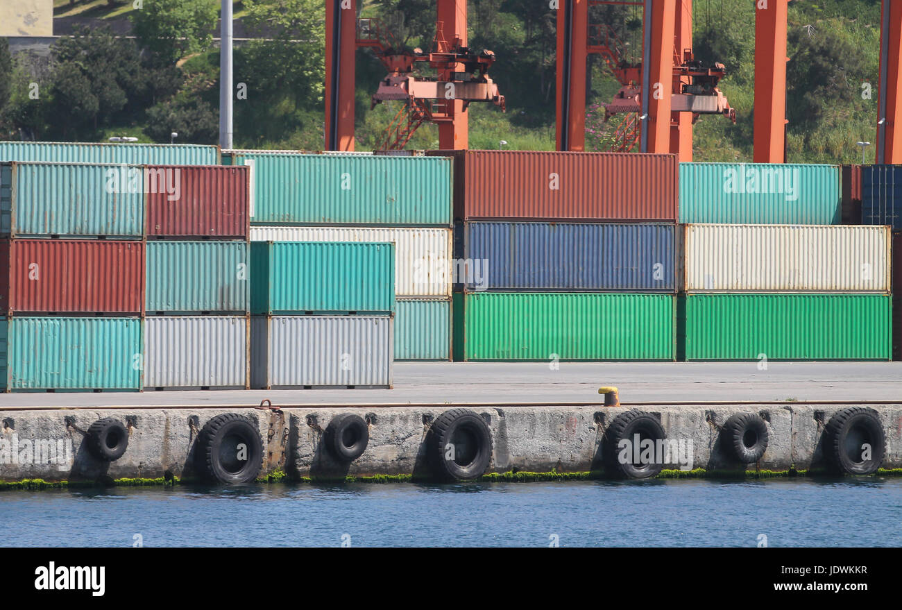 Containers waiting to transfer in a port Stock Photo - Alamy