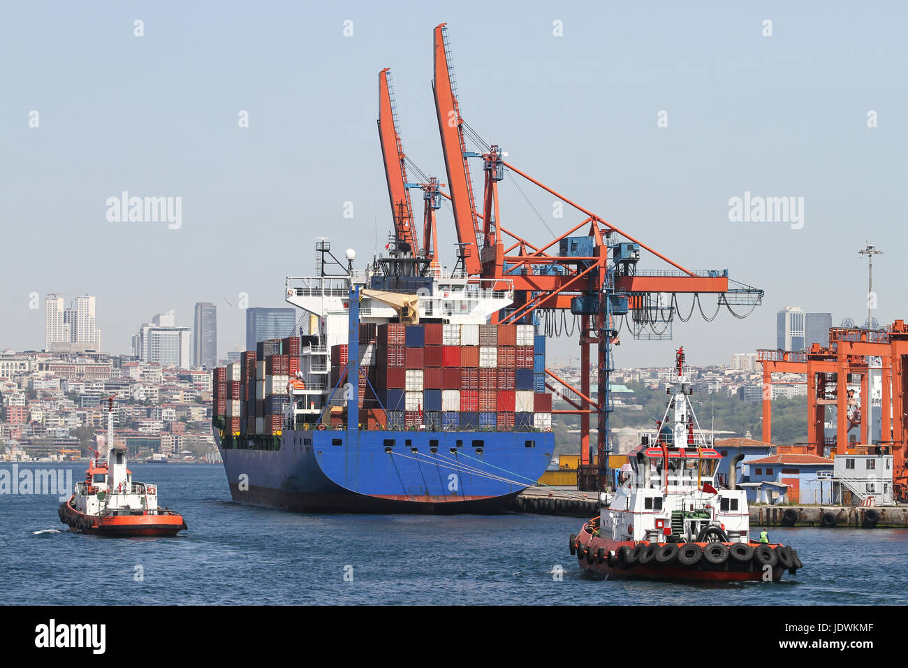Container Ship is loading in a port Stock Photo - Alamy