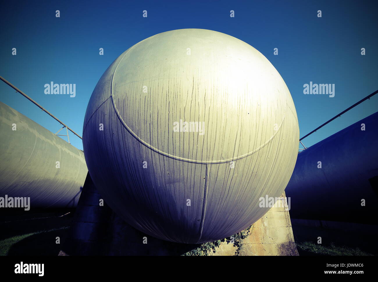 Large tank for storing natural gas in an industrial plant Stock Photo ...
