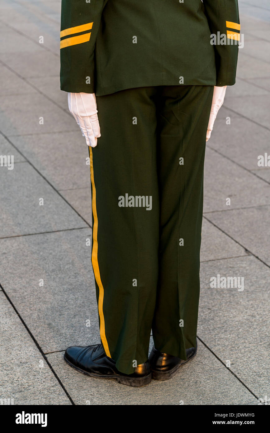 Soldier standing in a stiff position at Tiananmen Square, Beijing ...