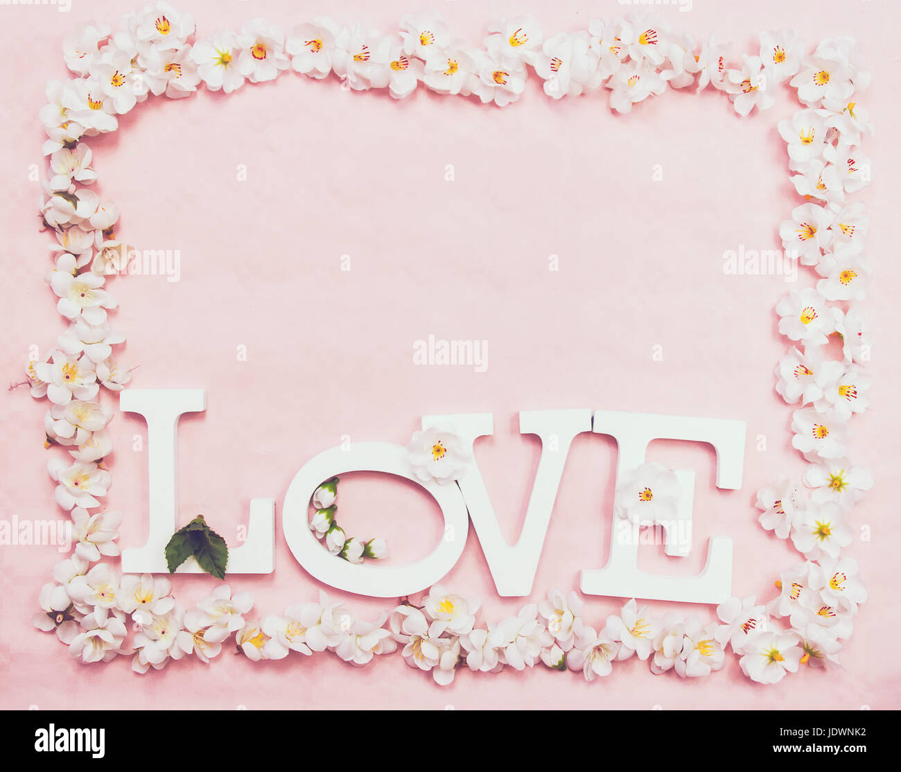 Word "love" with a flower frame Stock Photo - Alamy