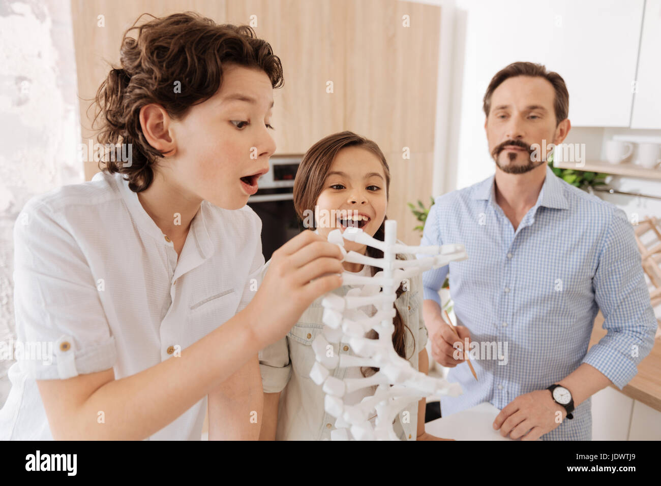 Sweet little kids being excited about new discovery Stock Photo - Alamy