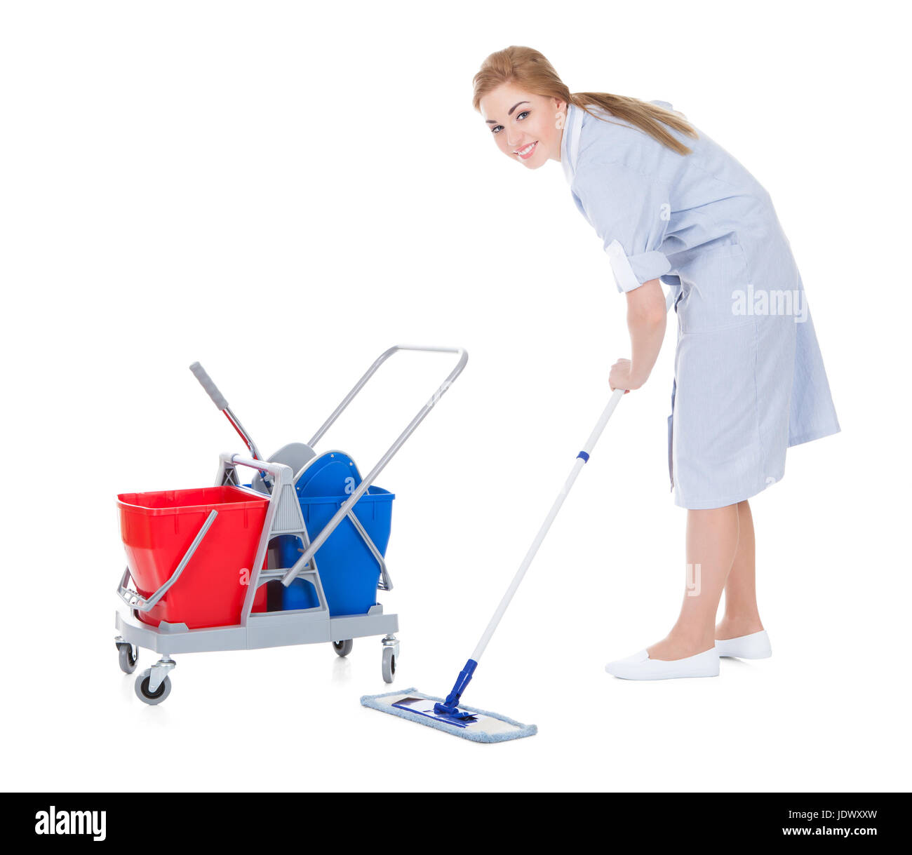 Portrait Of Young Female Maid Cleaning Floor With Mop Stock Photo - Alamy