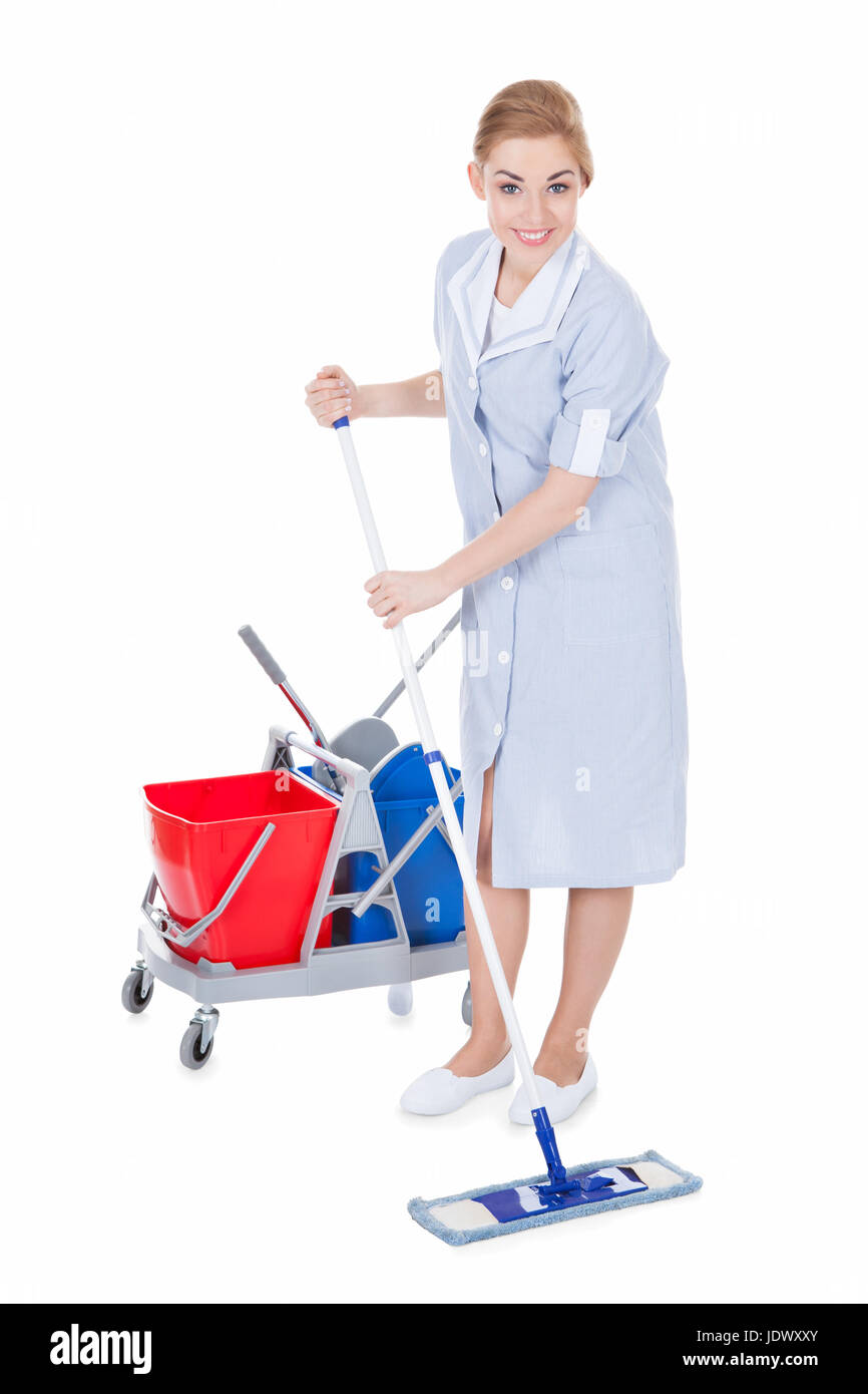 Portrait Of Young Female Maid Cleaning Floor With Mop Stock Photo - Alamy