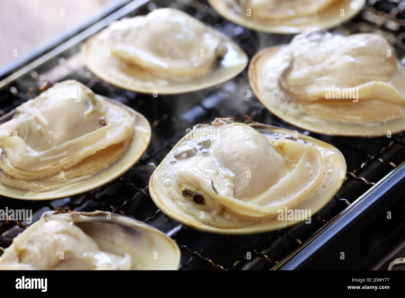 grilled clams, yaki hamaguri, japanese food Stock Photo - Alamy