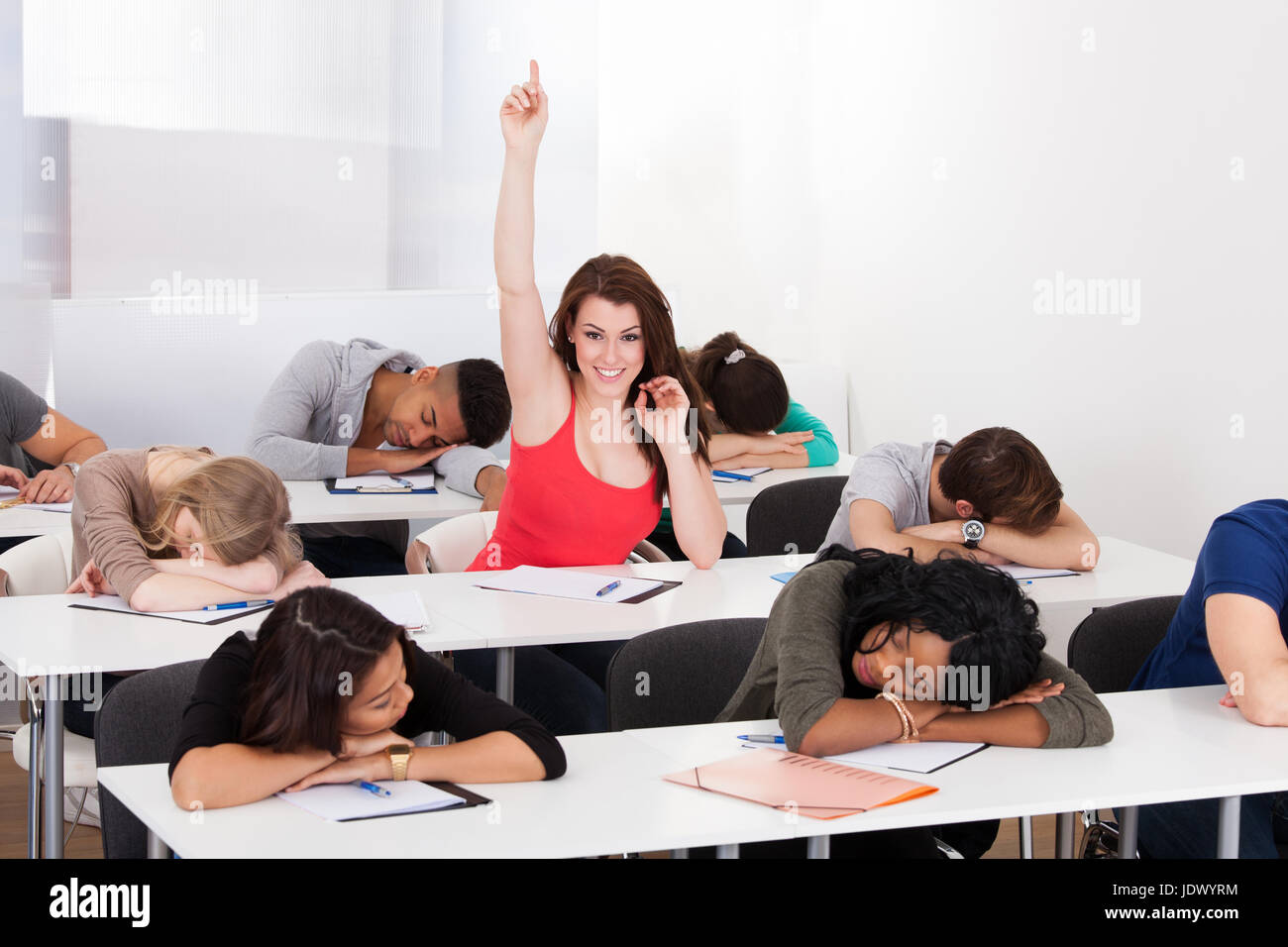 College Students Raising Hands