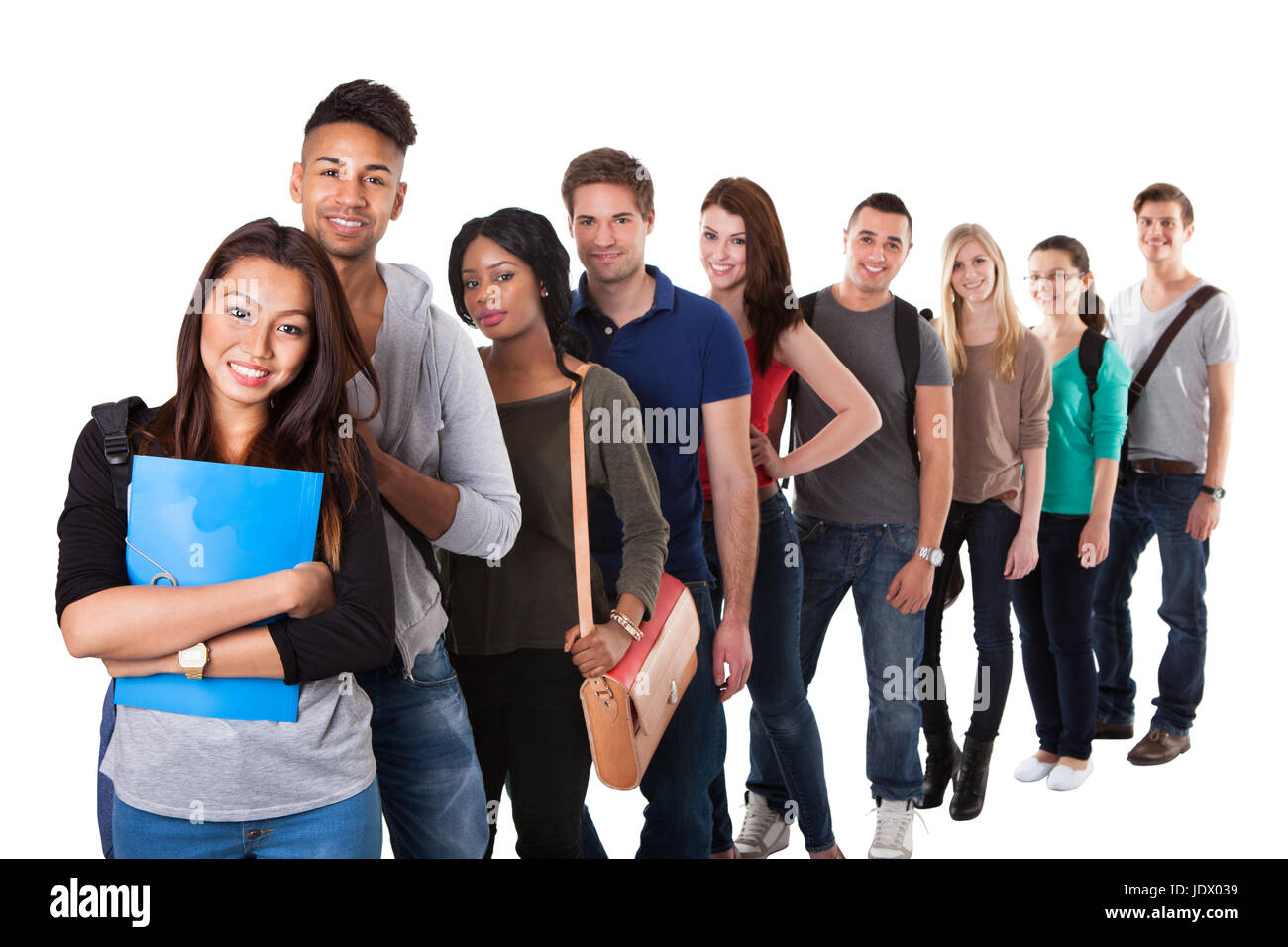 Portrait of multiethnic college students standing in a line over white ...