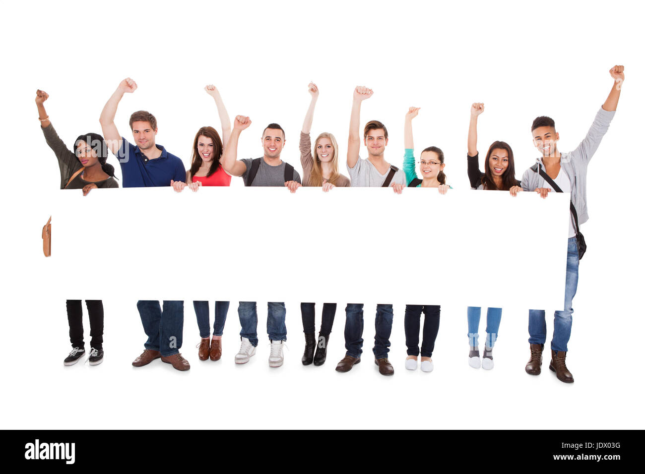 Full length portrait of successful college students displaying blank ...