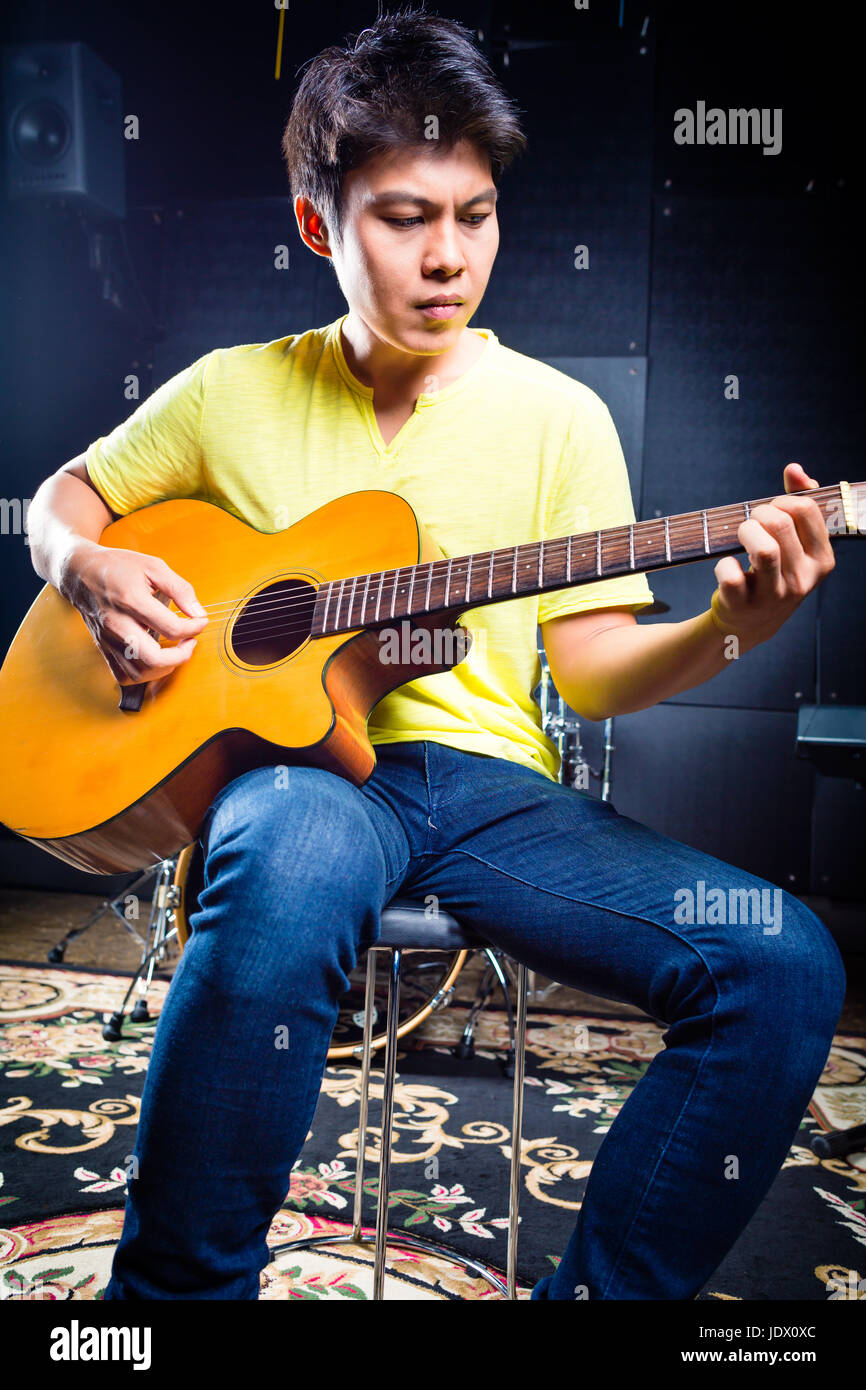 Asian handsome guitarist artist man hi-res stock photography and images ...