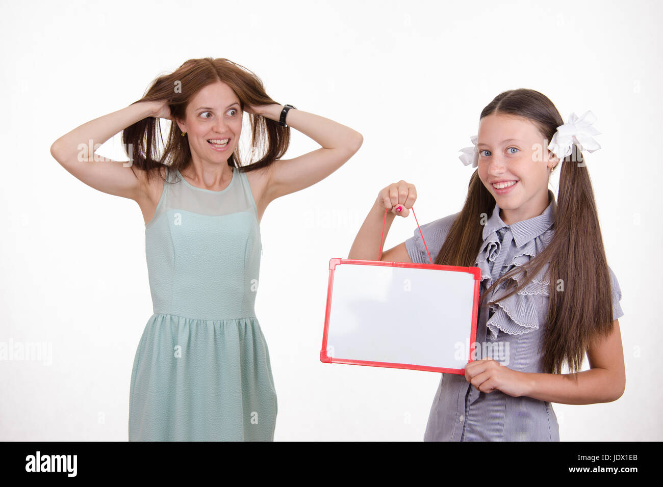 Trainee fun and mocks a good teacher Stock Photo - Alamy