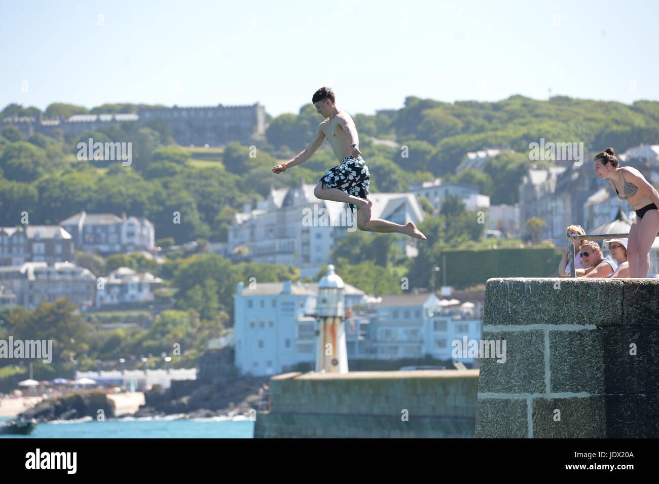 Boy Jumping Off Pier Stock Photos & Boy Jumping Off Pier Stock Images ...