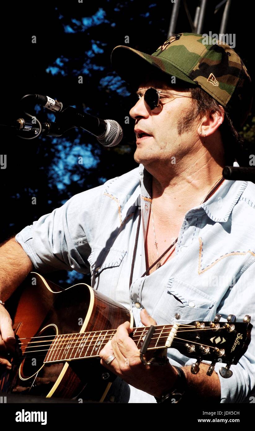 Steve Earle performing at the Strictly Bluegrass festival held at ...