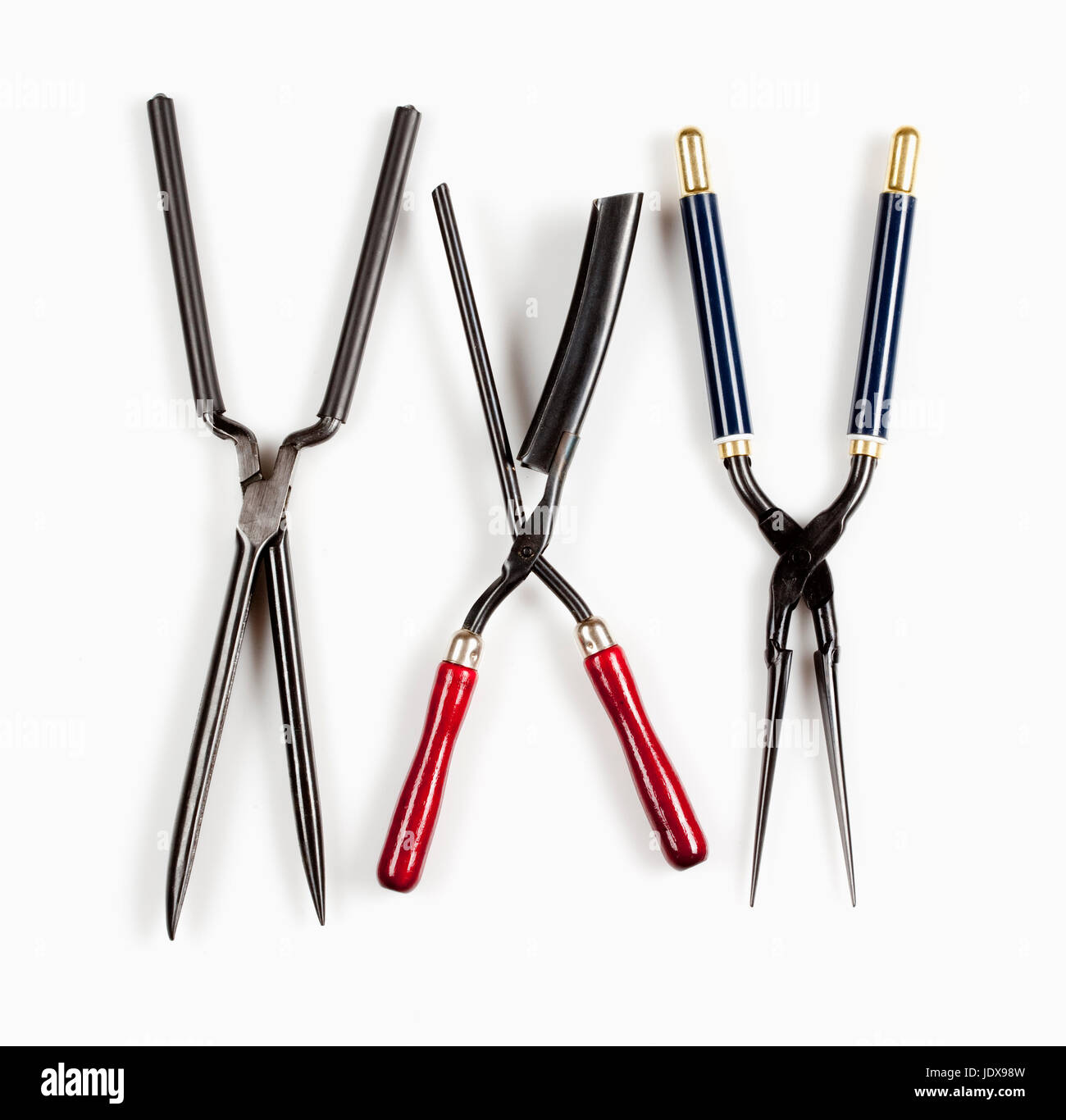 Set of Different Hairdresser Tongs Stock Photo - Alamy