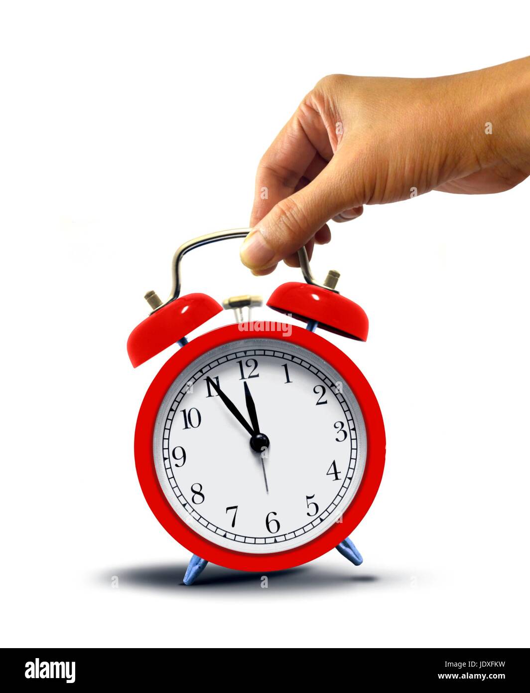 Hand Holding Alarm Clock Stock Photo - Alamy