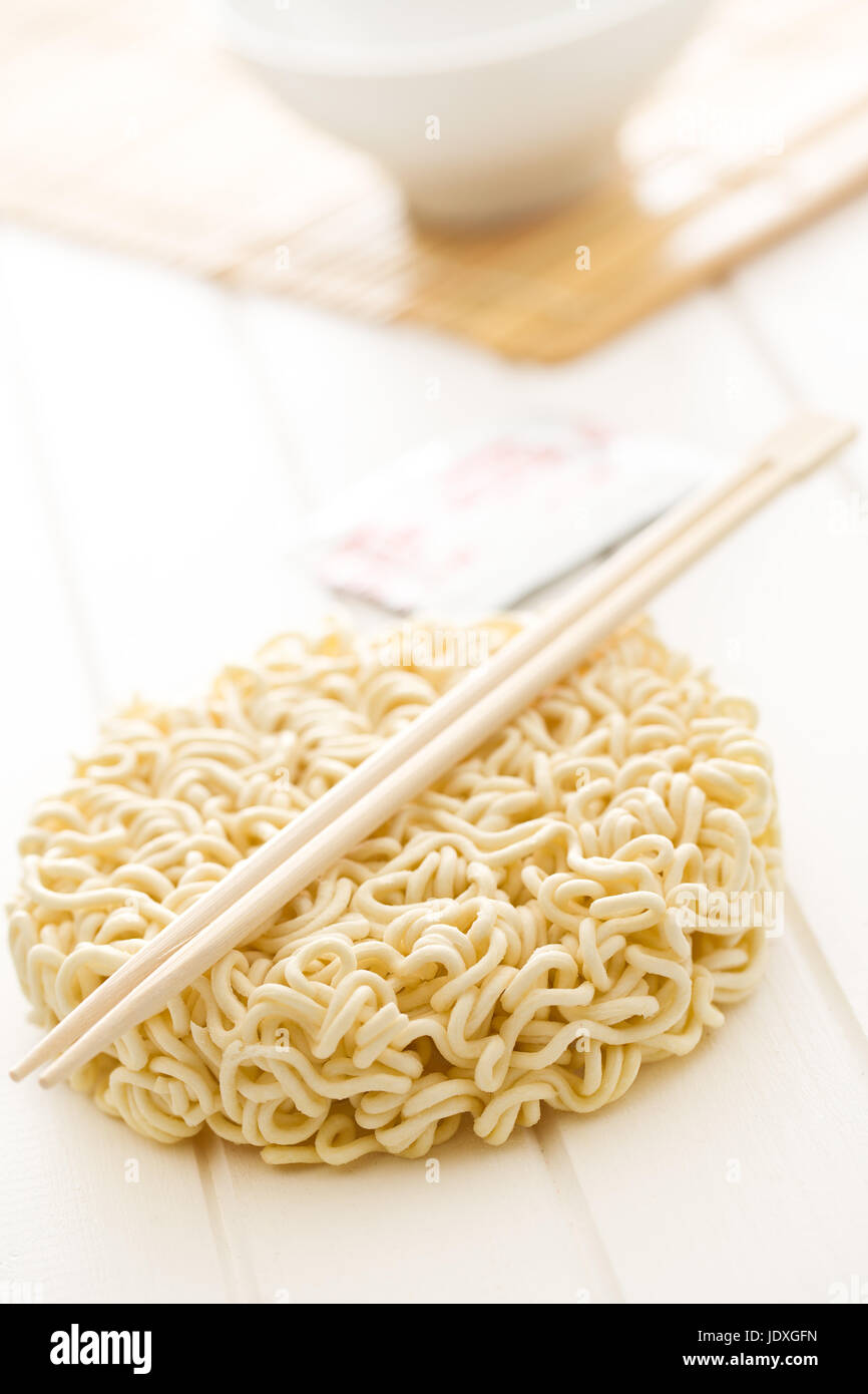 instant noodles on white table Stock Photo - Alamy