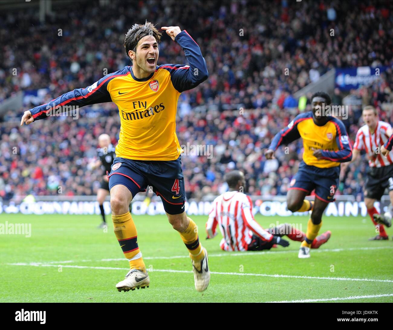Cesc fabregas arsenal celebrates hi-res stock photography and images ...