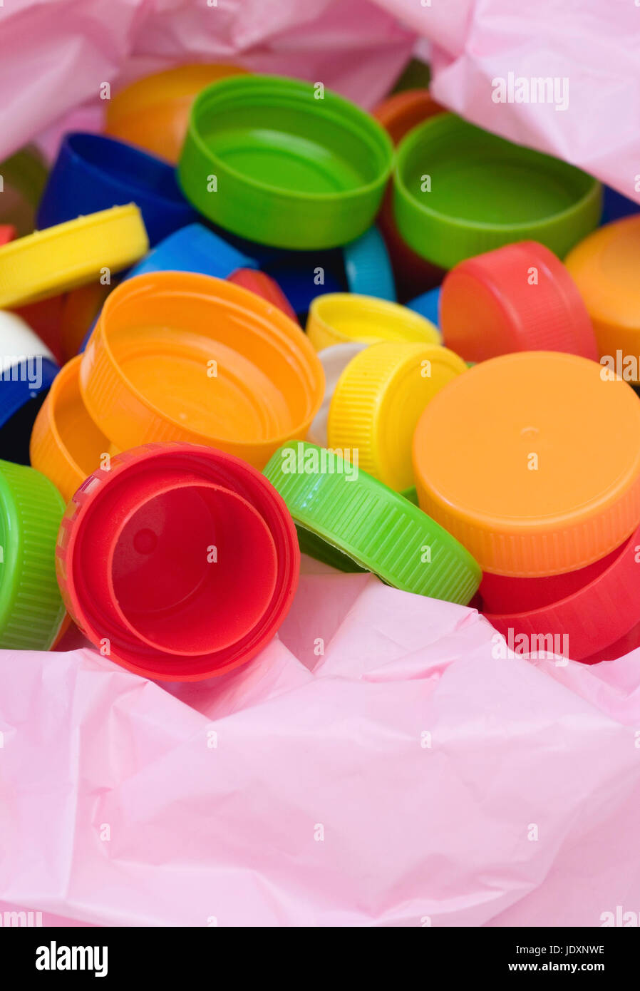 bottle plastic caps in garbage bag Stock Photo - Alamy