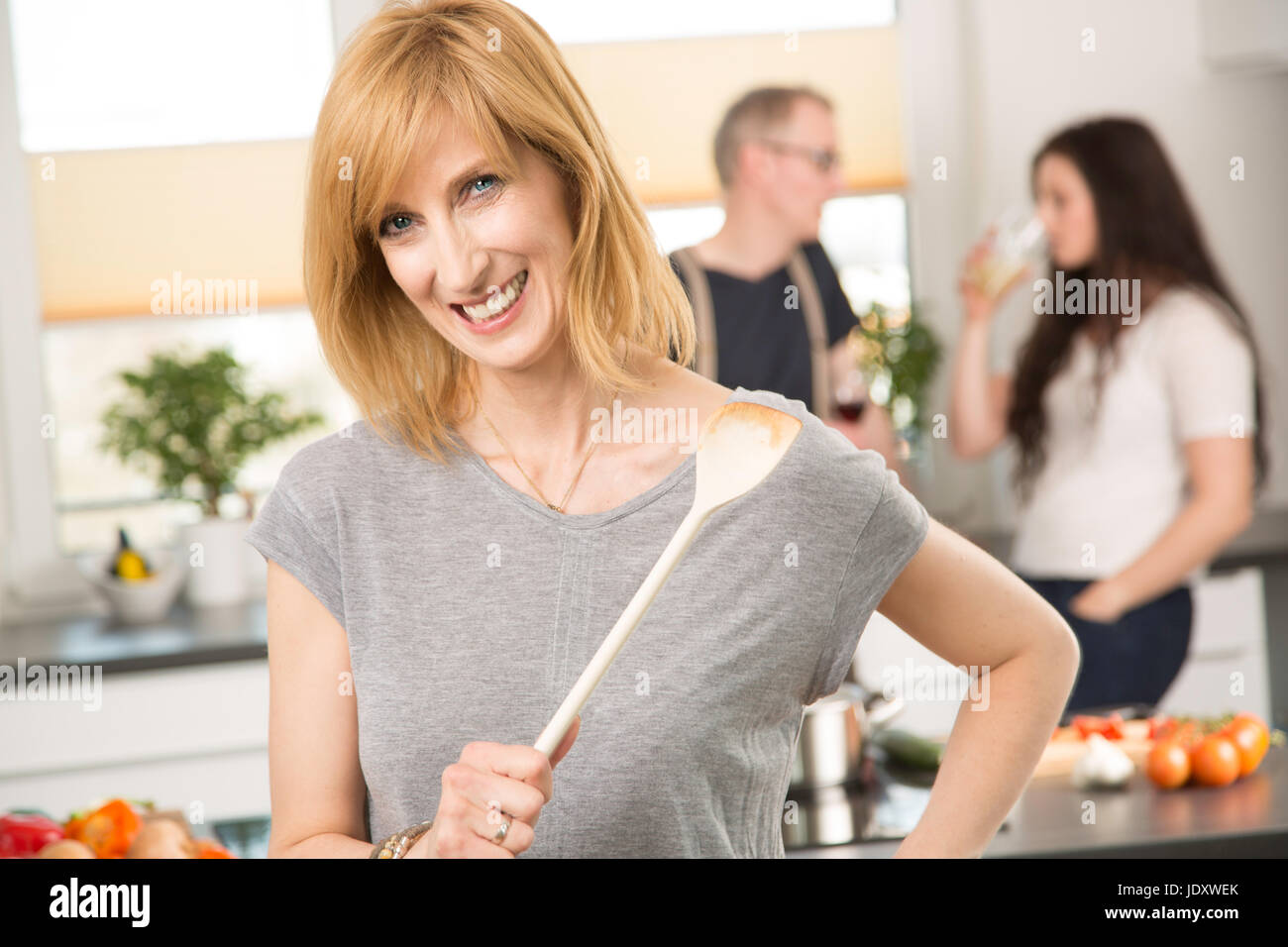 people in the kitchen Stock Photo - Alamy