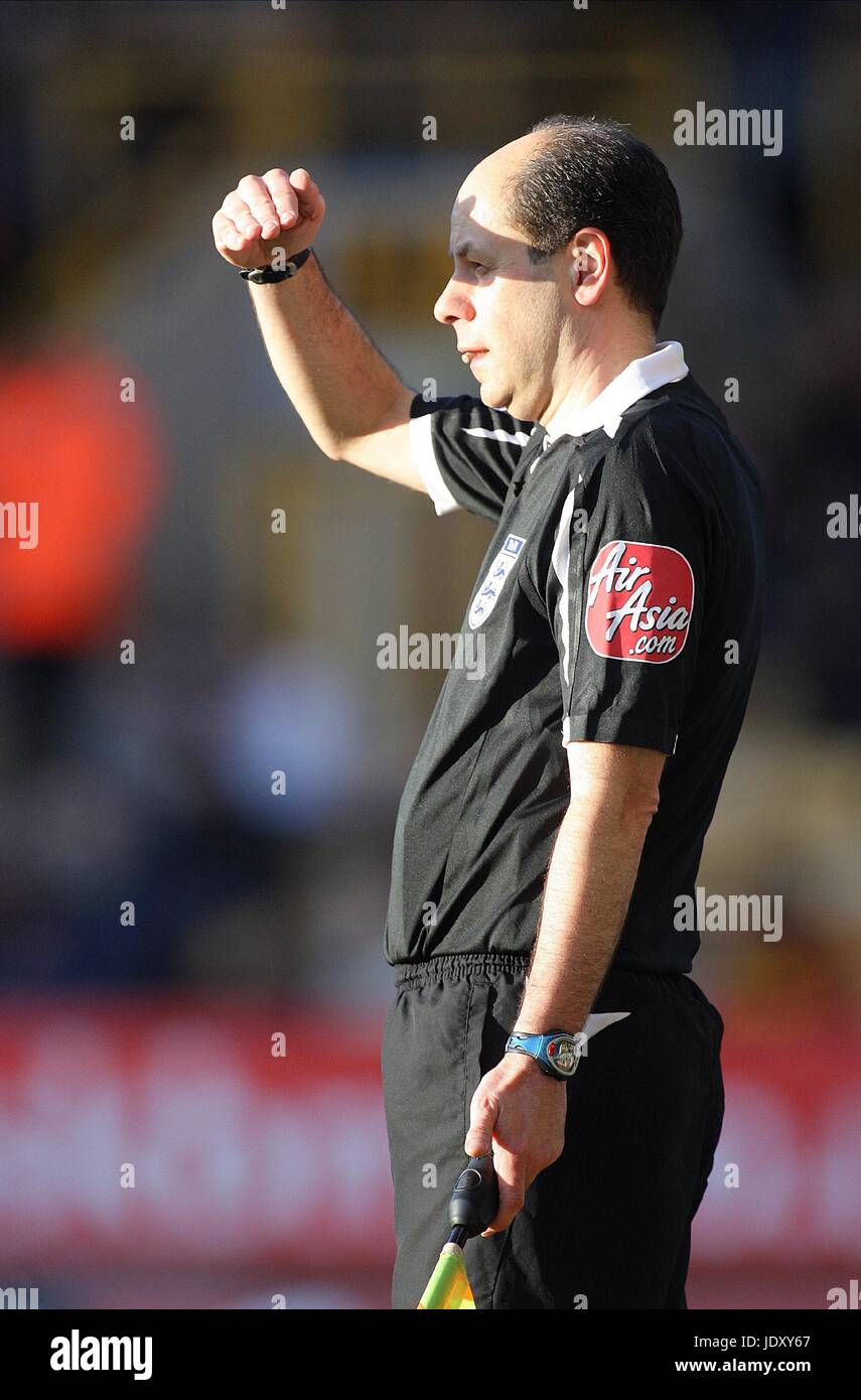 LINES-MAN SHADES HIS EYES ASSISTANT REFEREE COVERS EYES MOLINEUX ...
