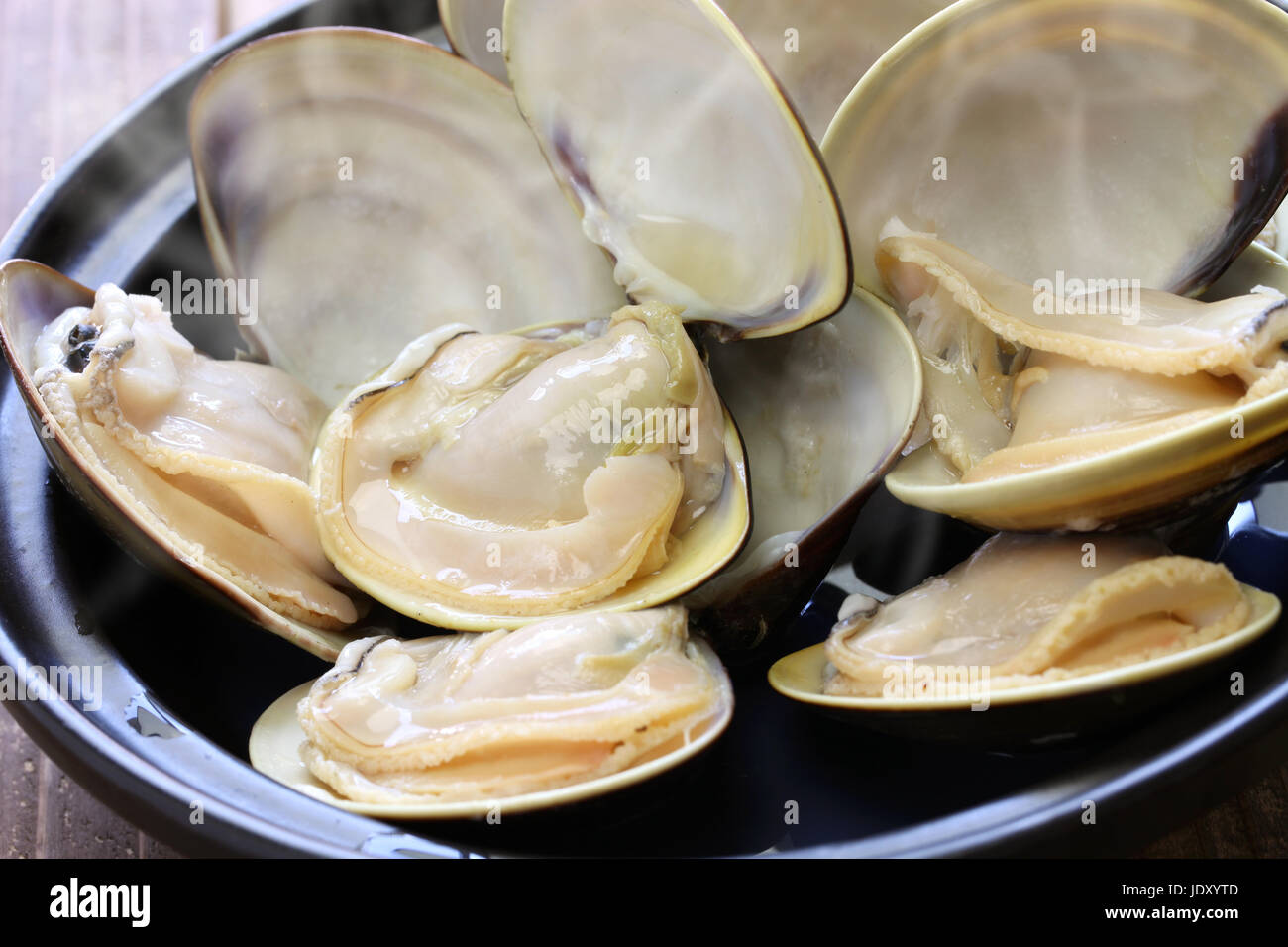 sake steamed japanese clams, hamaguri no sakamushi Stock Photo - Alamy