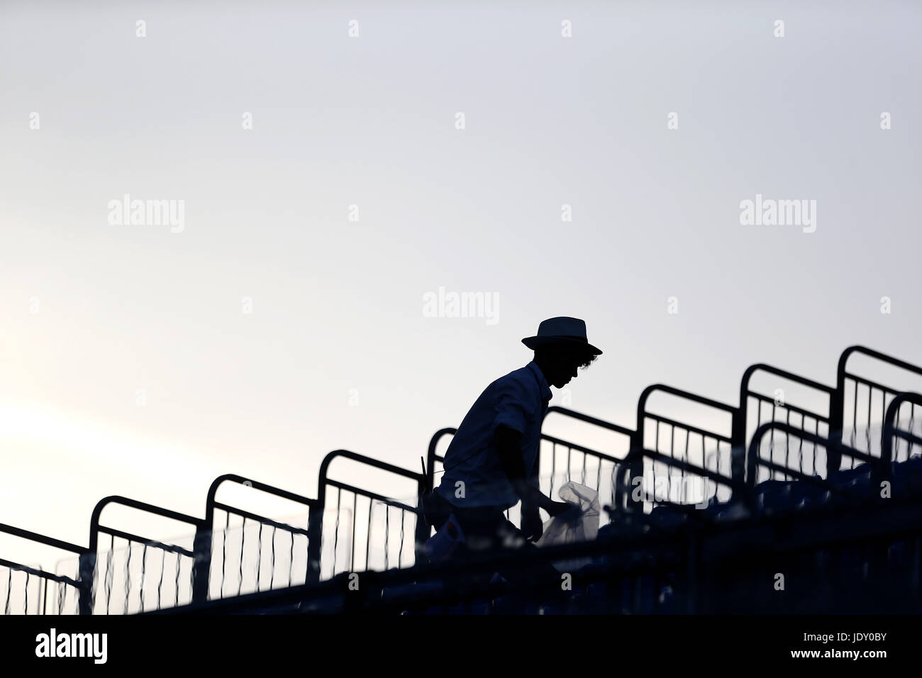 General view of a steward cleaning up during the end of day three of ...