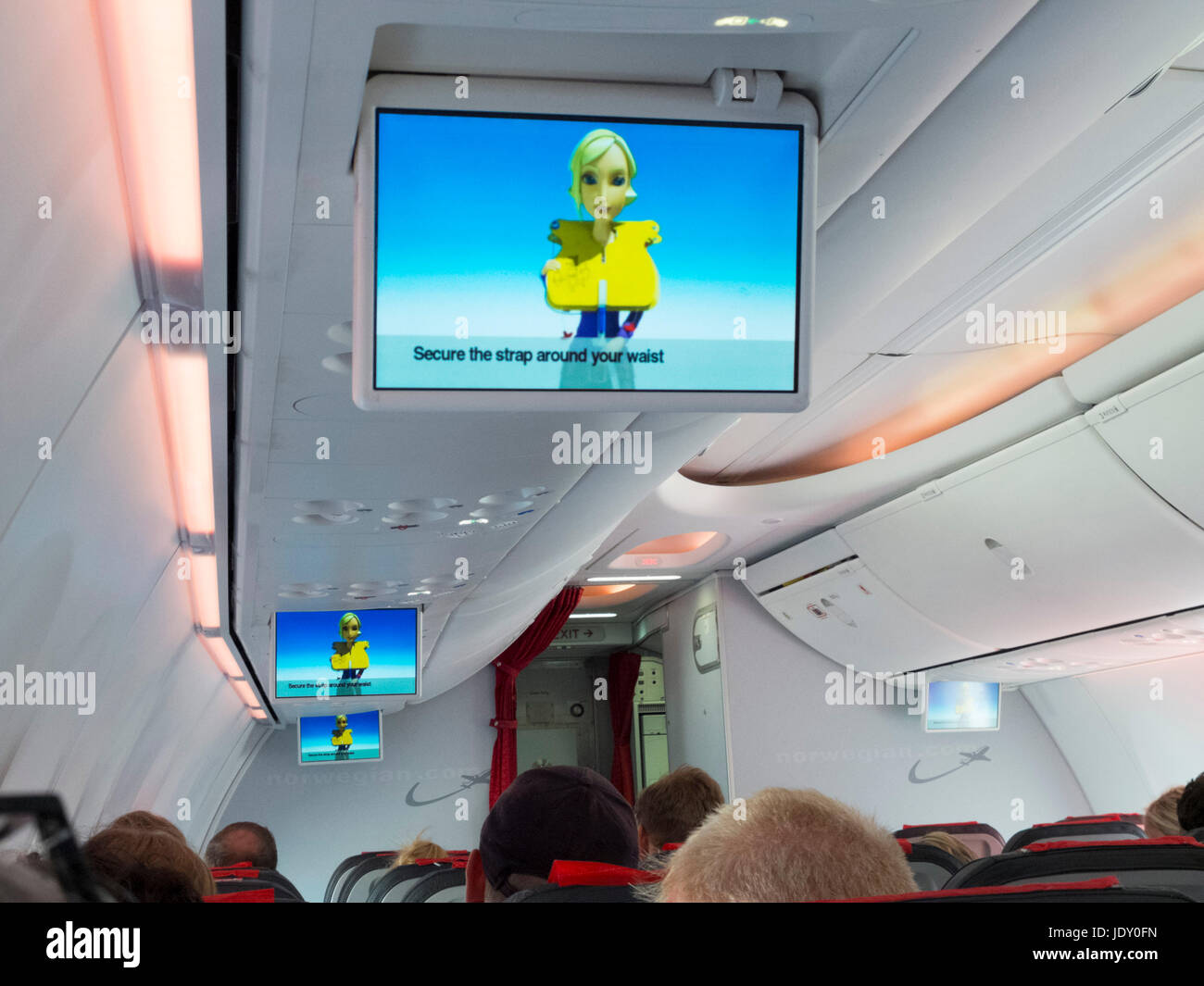 Airline safety demonstration hi-res stock photography and images - Alamy