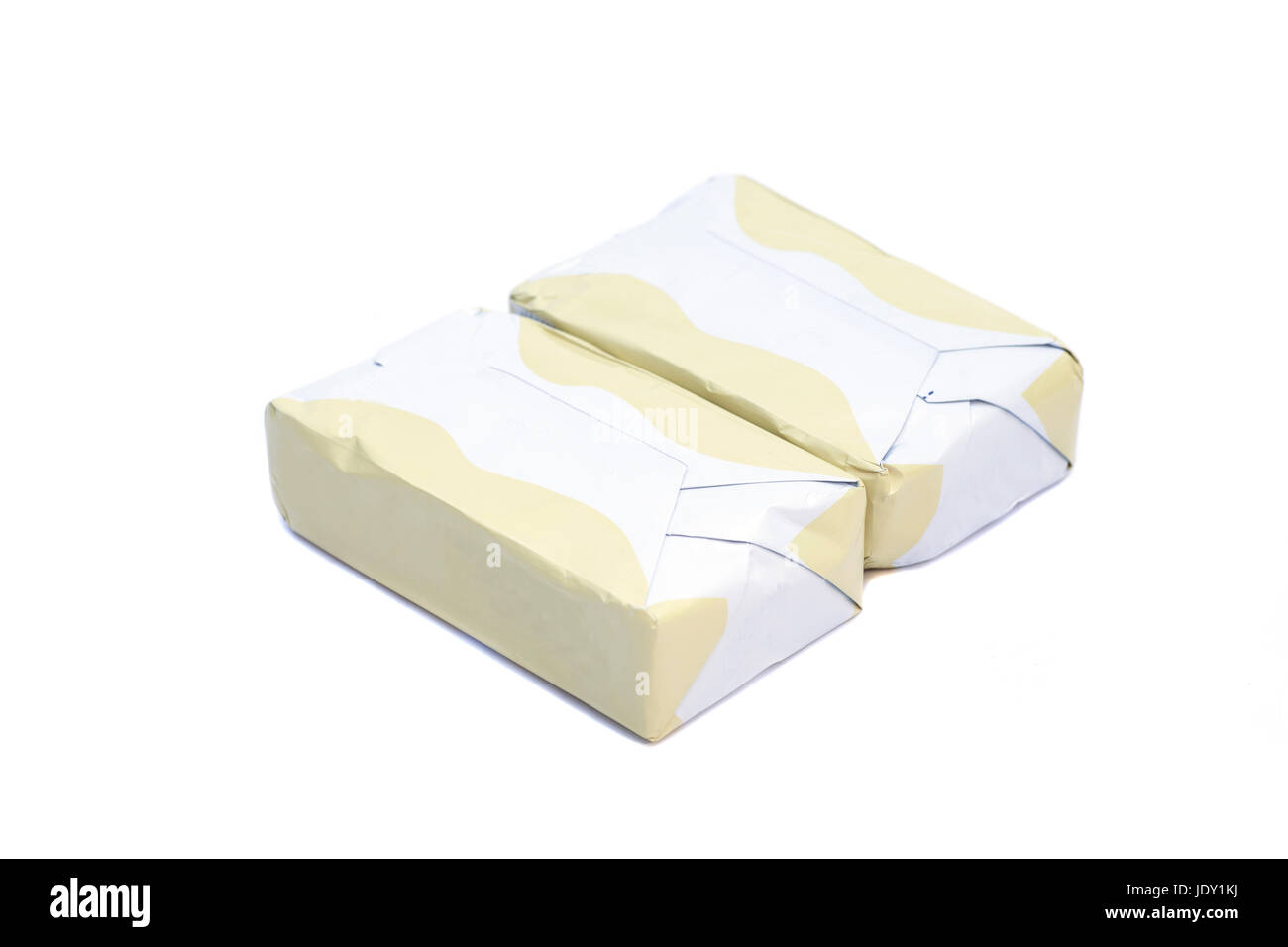 wrapped butter sticks isolated on white background Stock Photo - Alamy