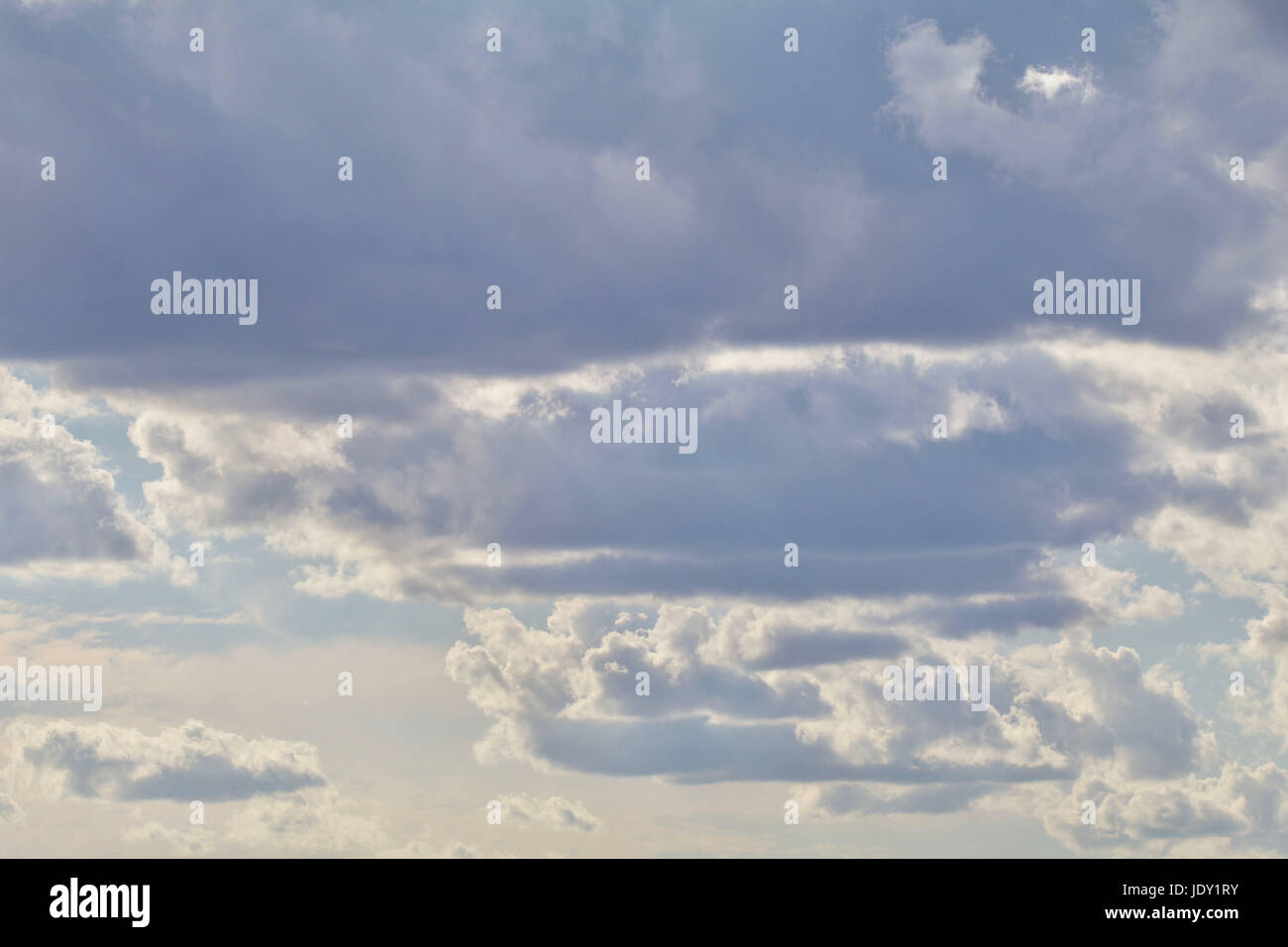 Mostly cloudy sky Stock Photo - Alamy