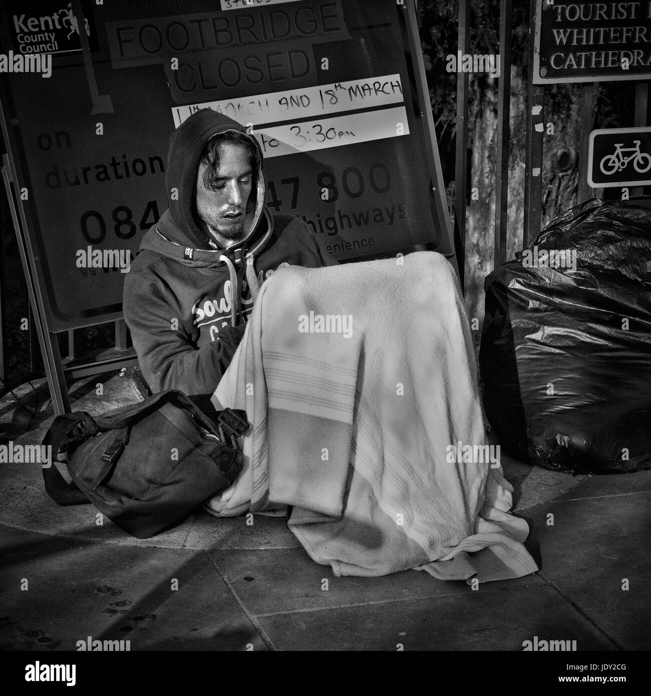 Homeless Man,Youth,asleep,belongings,plastic sack Stock Photo - Alamy