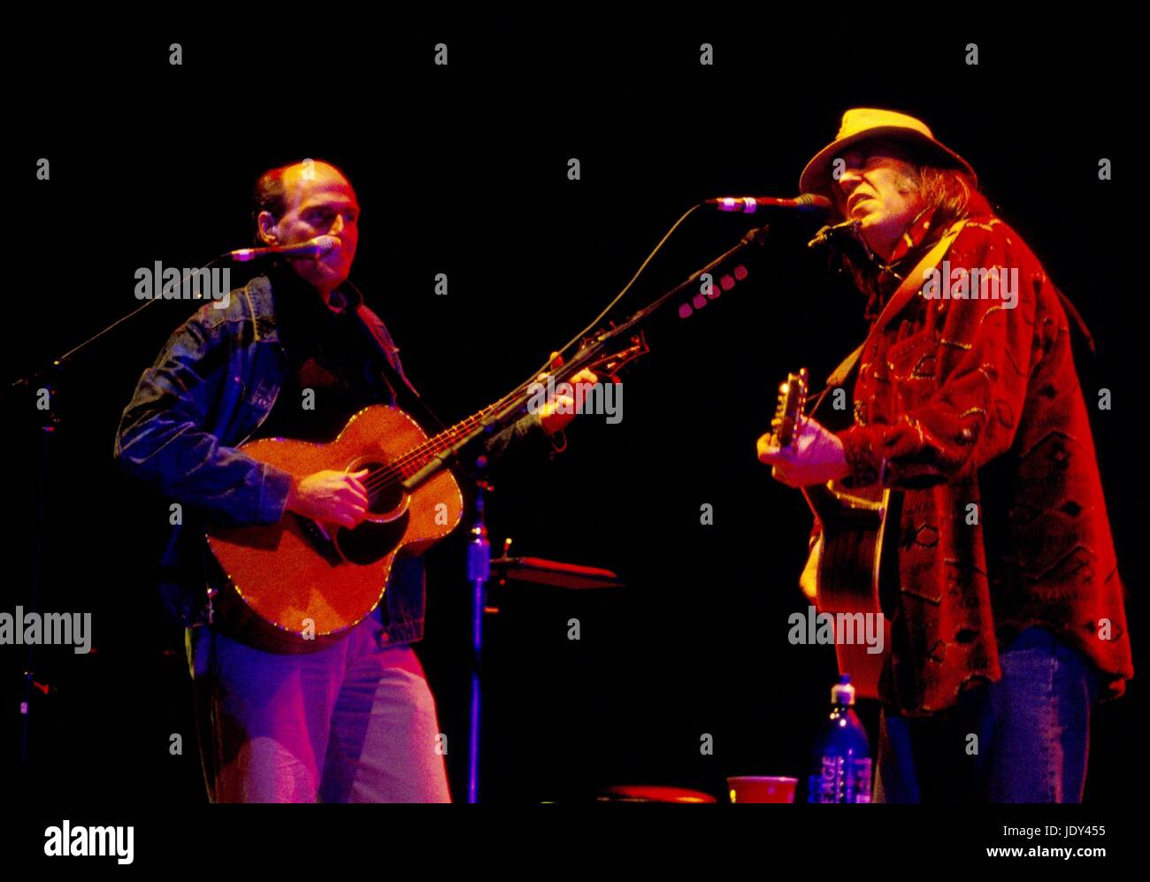 Neil Young and James Taylor performing in California, 2002. © Anthony ...