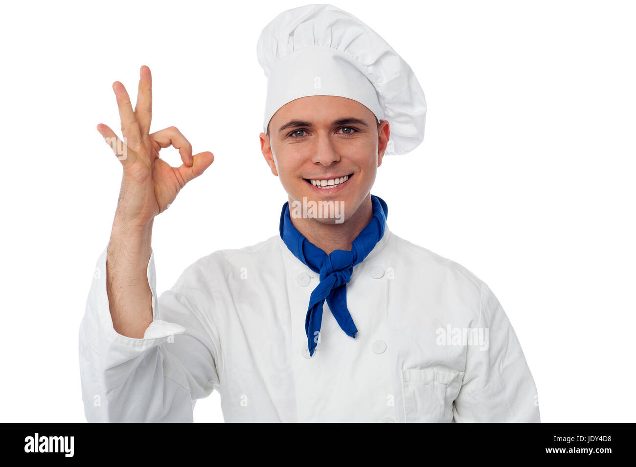 Smiling chef gesturing hand sign for excellence Stock Photo - Alamy