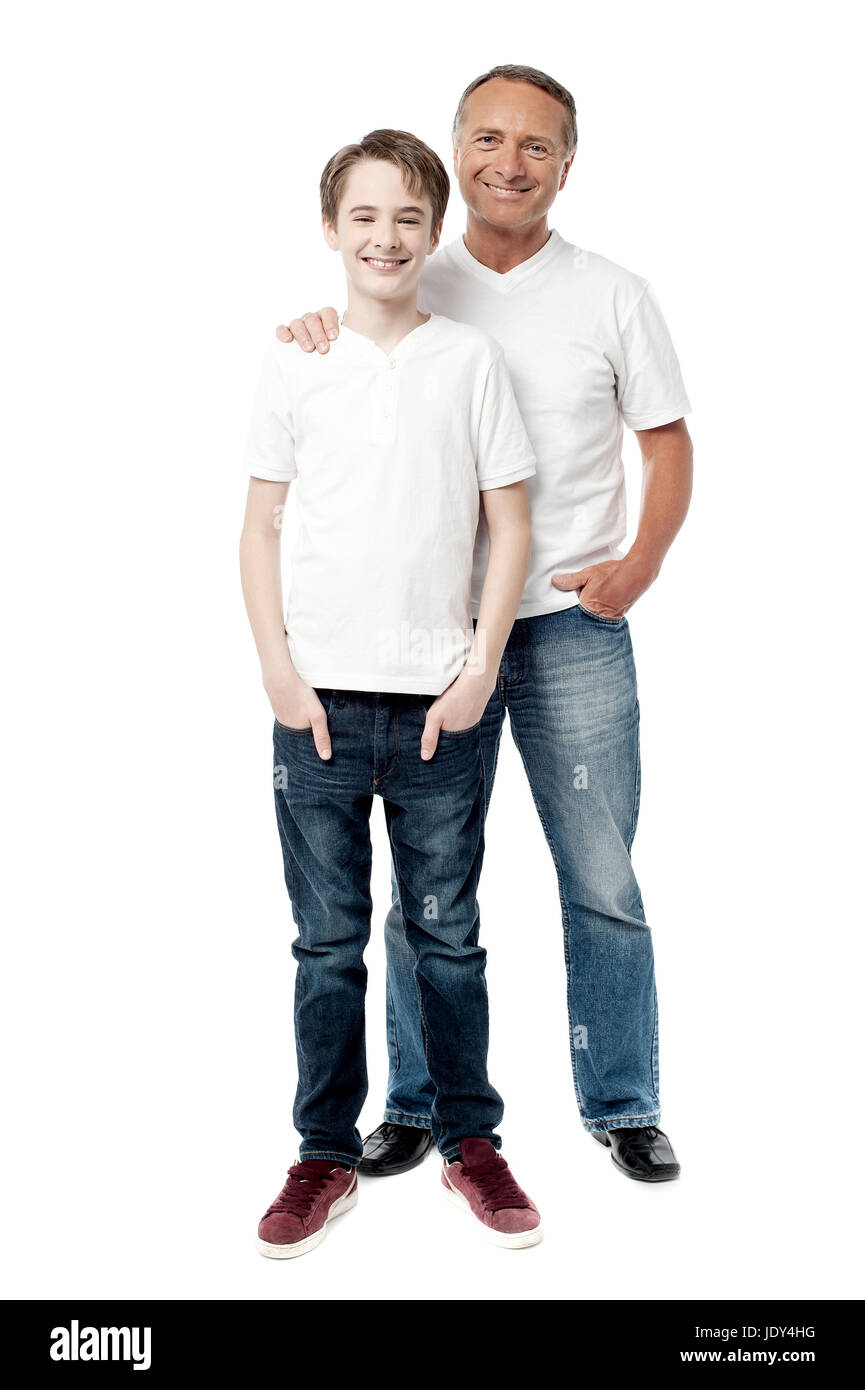 Happy family posing in studio Cut Out Stock Images & Pictures - Alamy