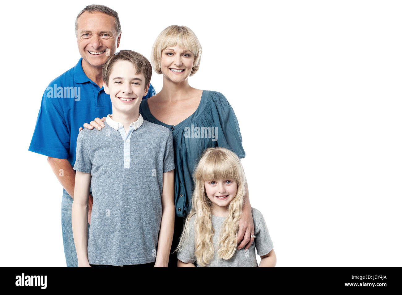 Cheerful family of four members posing together Stock Photo - Alamy