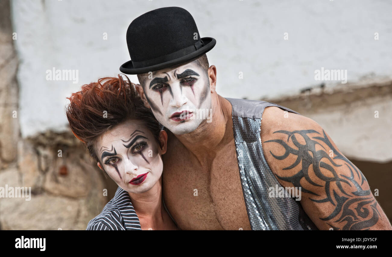 Strange pair of male and female cirque performers Stock Photo - Alamy