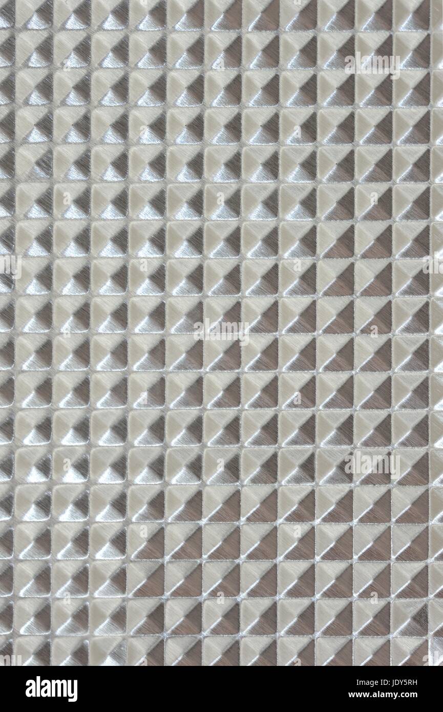 A close up shot of a metal background imprint Stock Photo - Alamy