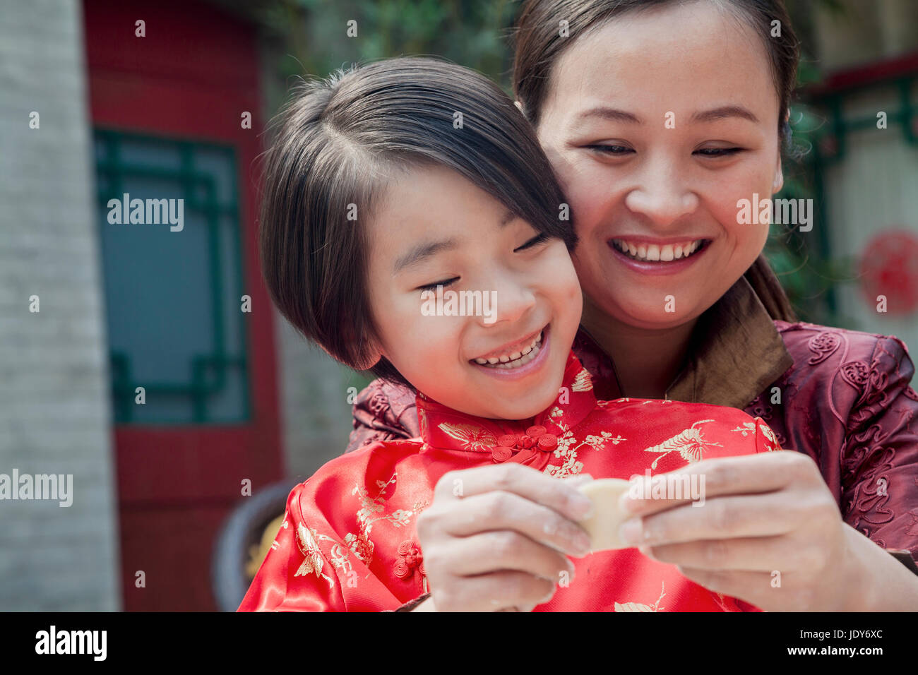 Smiling girls horizontal china hi-res stock photography and images - Alamy