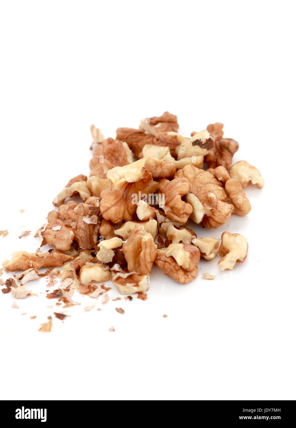 crushed walnuts on white background,image of a Stock Photo - Alamy
